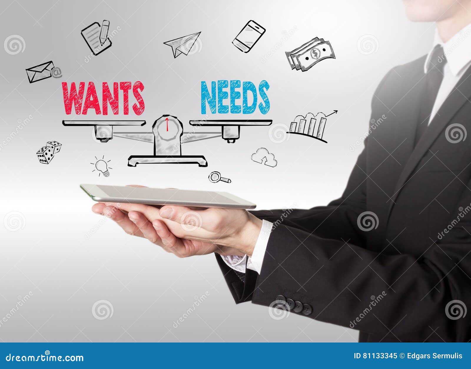 Wants and Needs Balance, Young Man Holding a Tablet Computer Stock ...