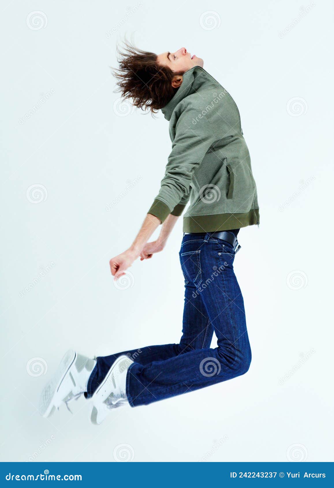 He Wants To Go Higher. a Young Man Jumping while Looking Upwards. Stock ...