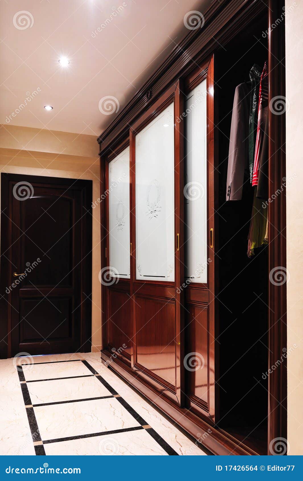 Luxury Wardrobe Room With Brown Modern Built-in Cabinets Royalty-Free ...
