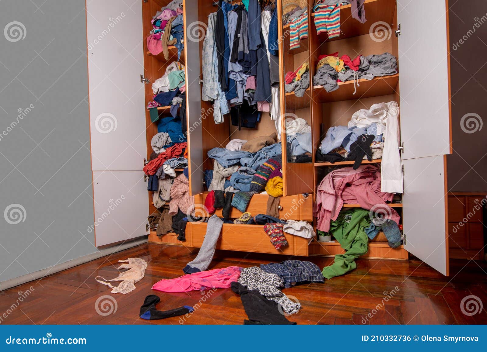 Wardrobe clutter. stock photo. Image of chiffonier, consumerism - 210332736