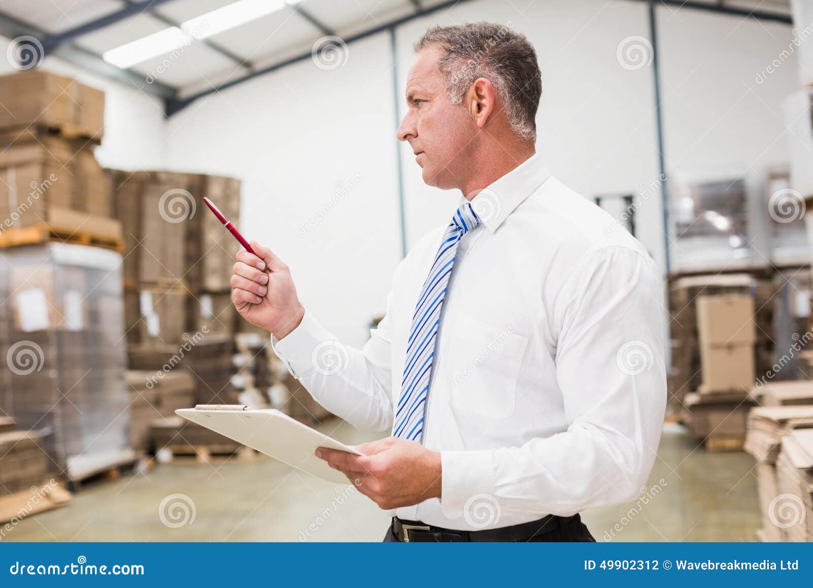 Warehouse Boss Checking His Inventor Stock Photo - Image of thoughtful ...