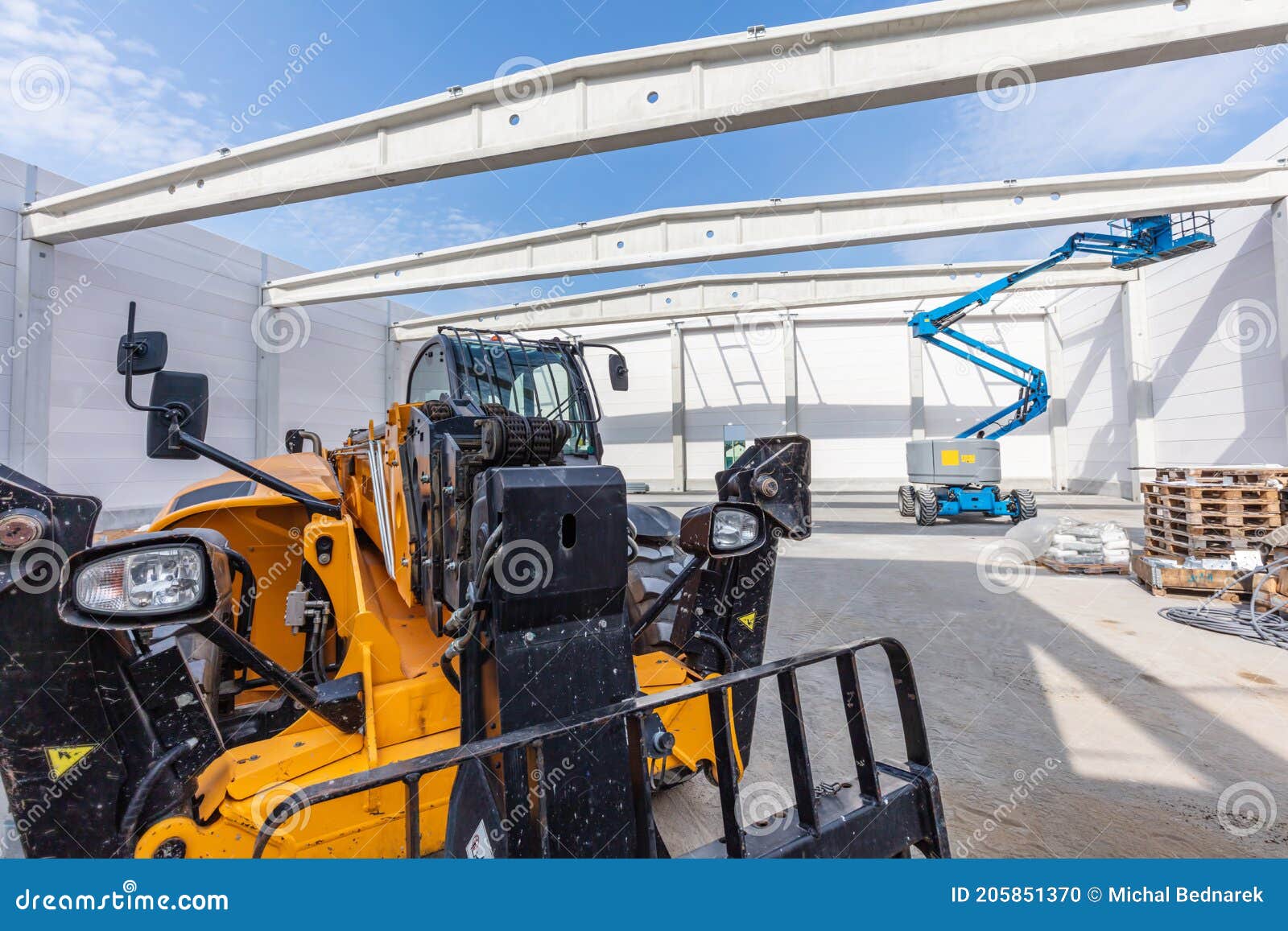 Warehouse Construction with Industrial Vehicles Stock Photo - Image of ...
