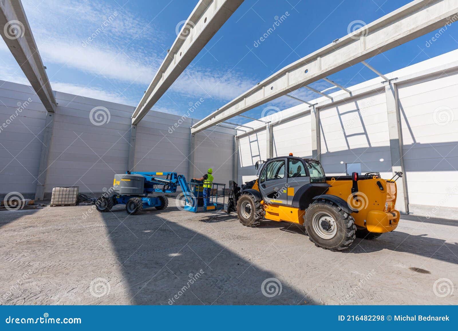 Warehouse Construction with Industrial Vehicles Stock Photo - Image of ...