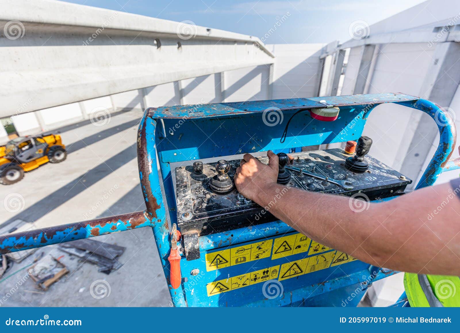 Warehouse Construction. Worker on Mobile Elavating Work Platform Stock ...