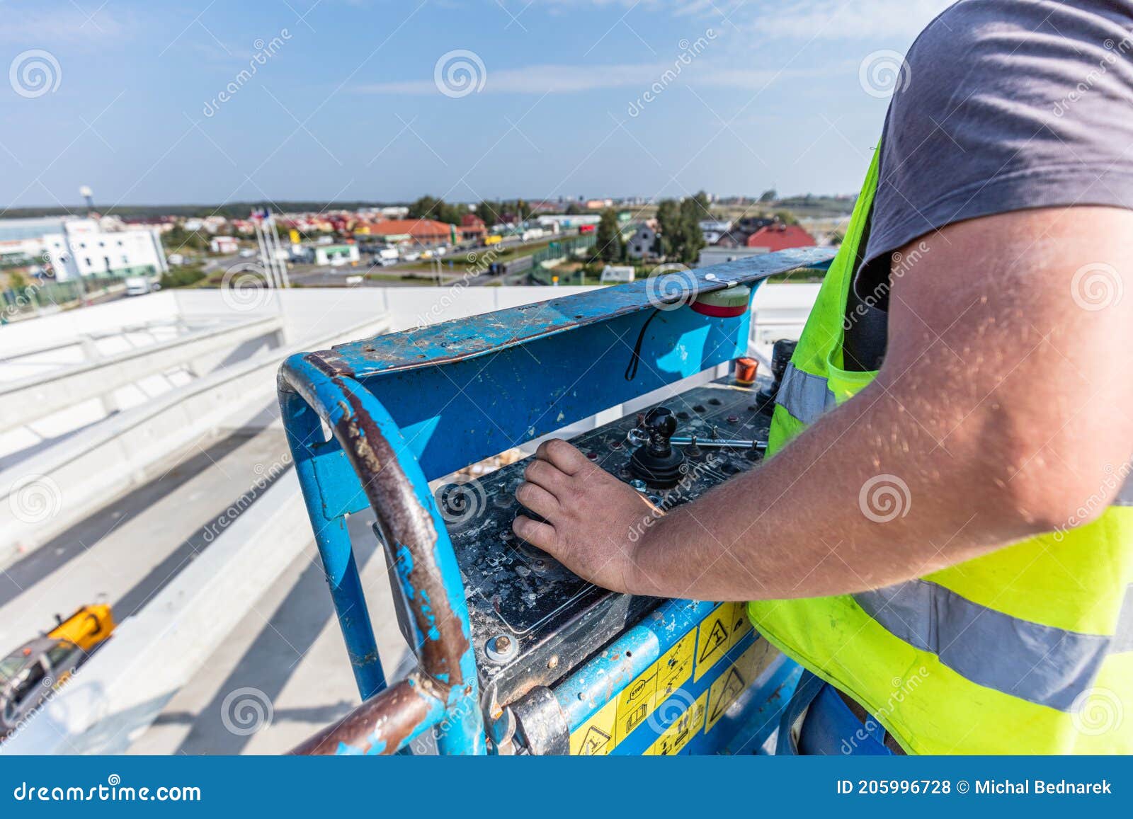 Warehouse Construction. Worker on Mobile Elavating Work Platform Stock ...