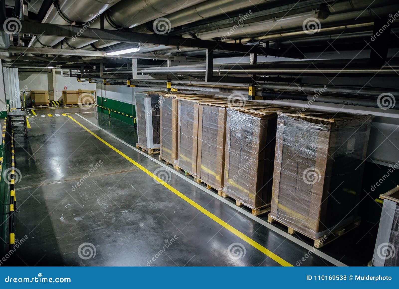 Warehouse Corridor. Goods in Carton and Polyethylene Packaging Stock ...