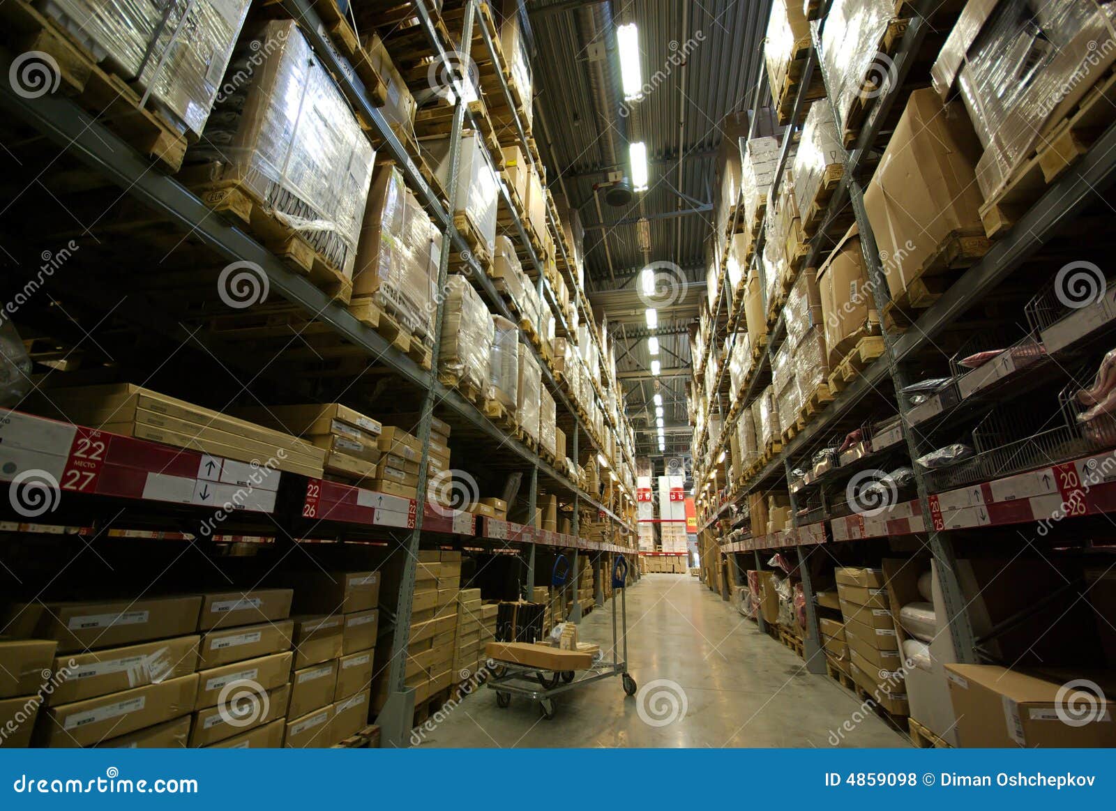 Warehouse Corridor and Handcart Stock Photo - Image of package ...
