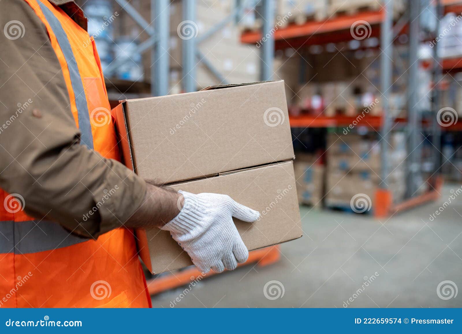 Warehouse Engineer in Workwear Carrying Boxes Stock Photo - Image of ...