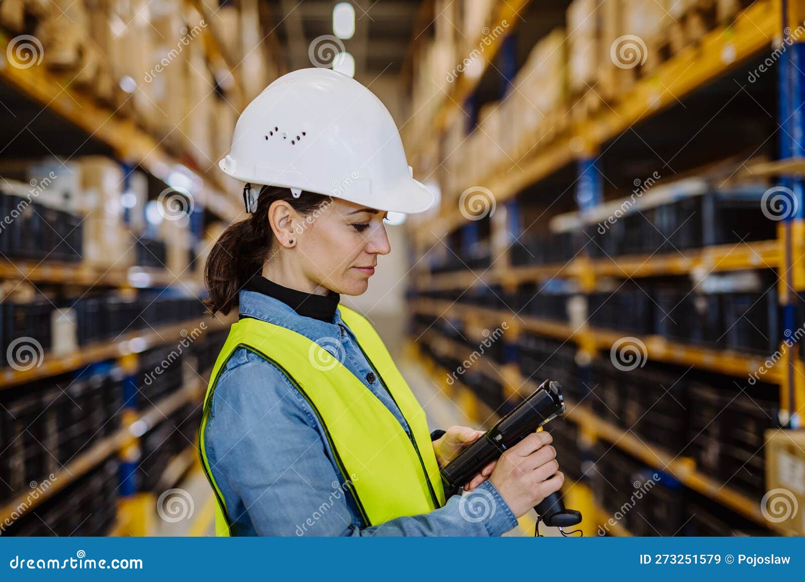 Warehouse Female Worker Checking Up Stuff in a Warehouse. Stock Image ...