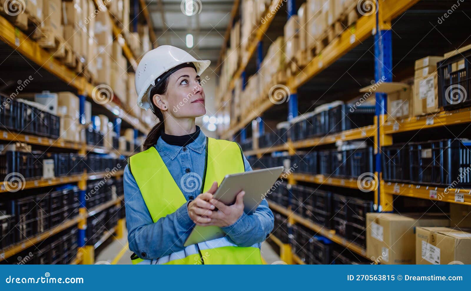 Warehouse Female Worker Checking Up Stuff in a Warehouse. Stock Image ...