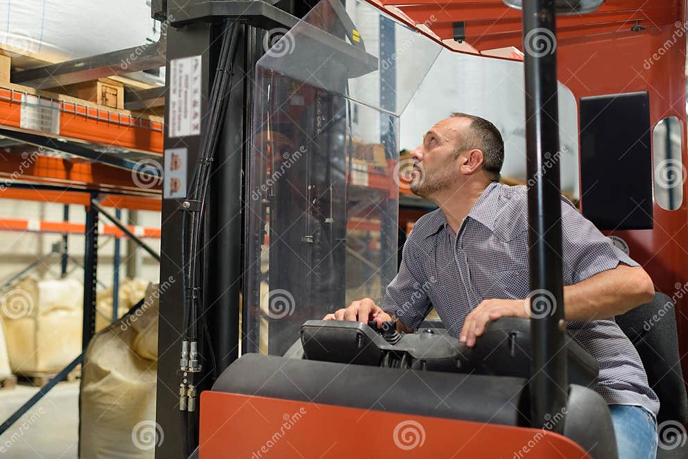 Warehouse Forklift Operator at Work Stock Image - Image of transportation, loader: 263612973