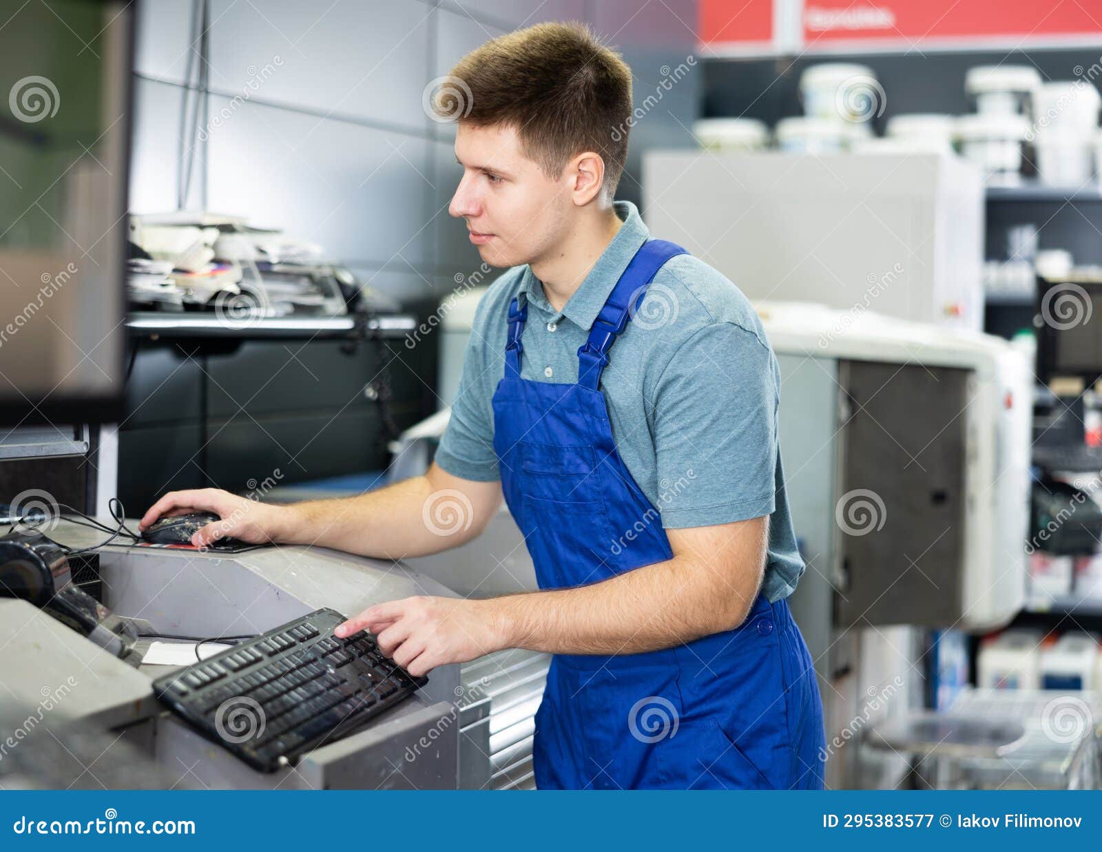 Warehouse Guy Employee Look at Computer Monitor Screen and Check ...