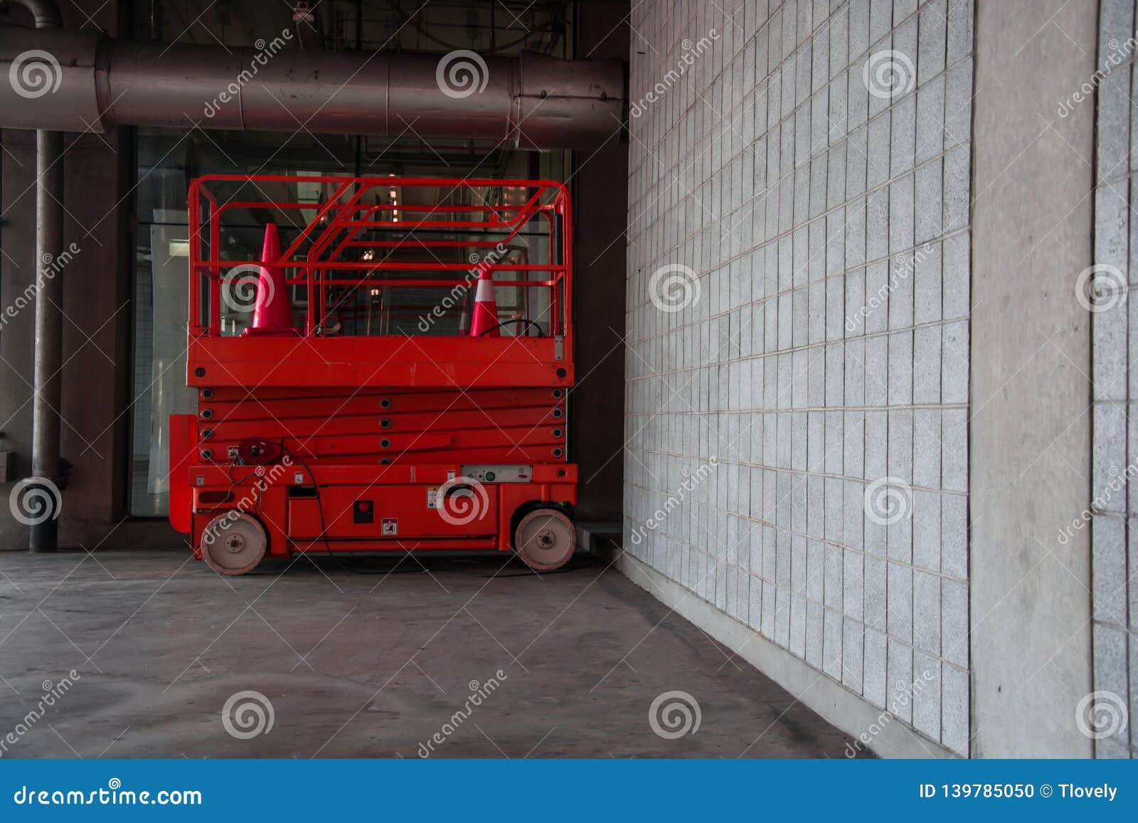 Warehouse Hall with Hydraulic Scissors Lift Stock Photo - Image of lift ...