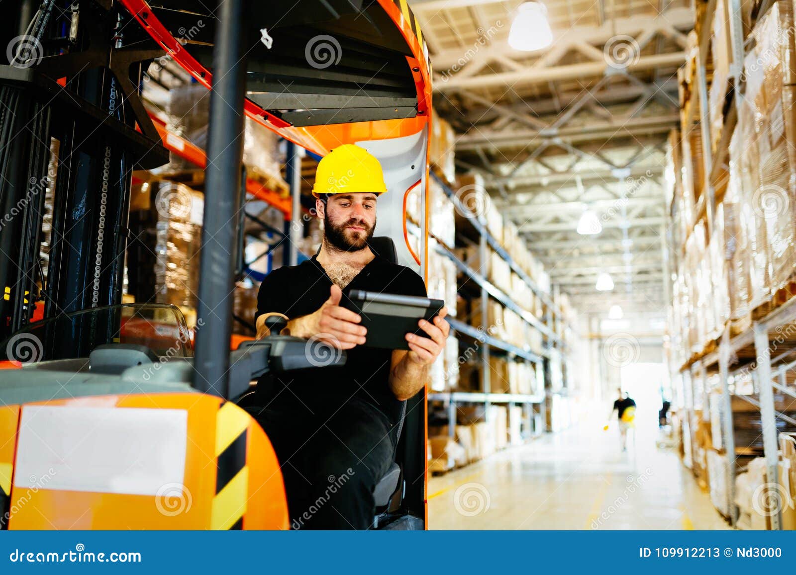 Warehouse Worker Doing Logistics Work with Forklift Loader Stock Image ...
