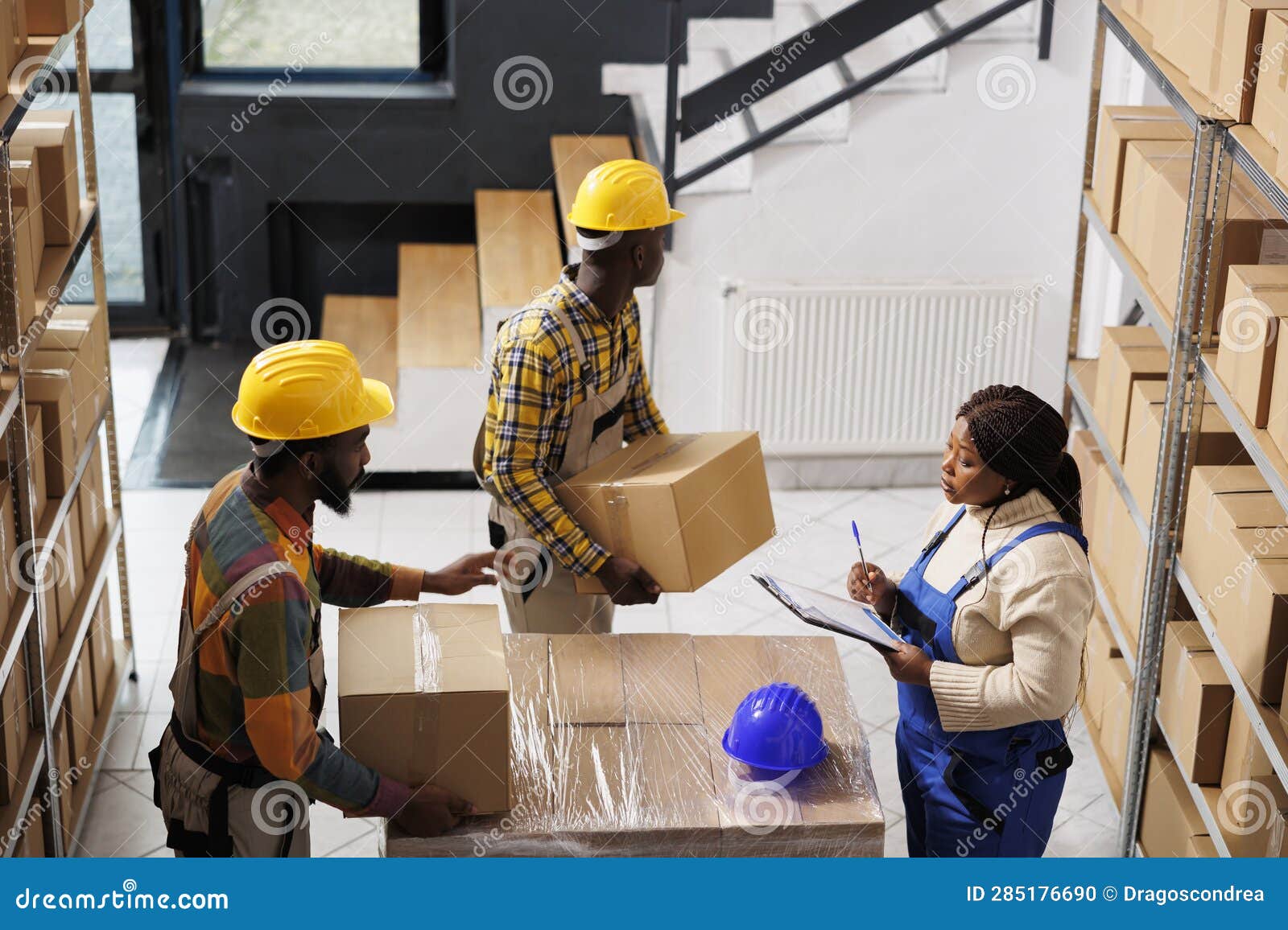 Warehouse Loaders Lifting Parcels Ready for Shipment Stock Photo ...