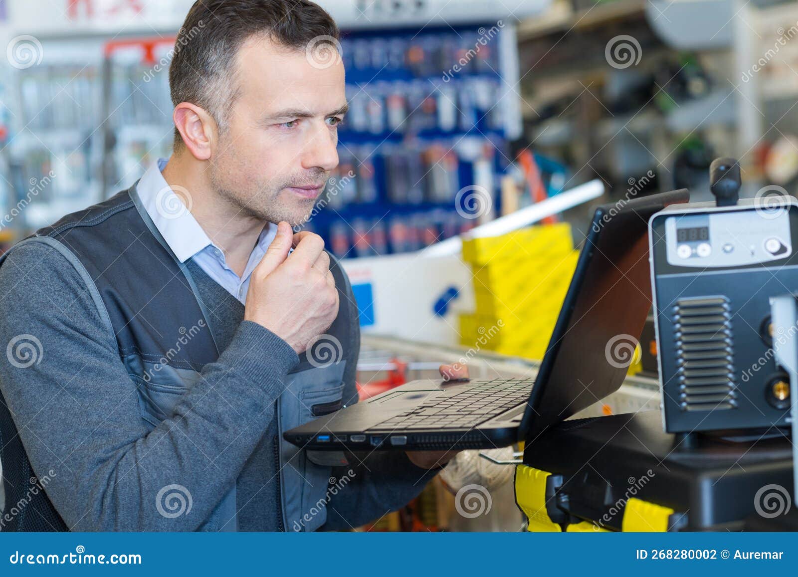 Warehouse Man Using Laptop in Warehouse Stock Photo - Image of computer ...