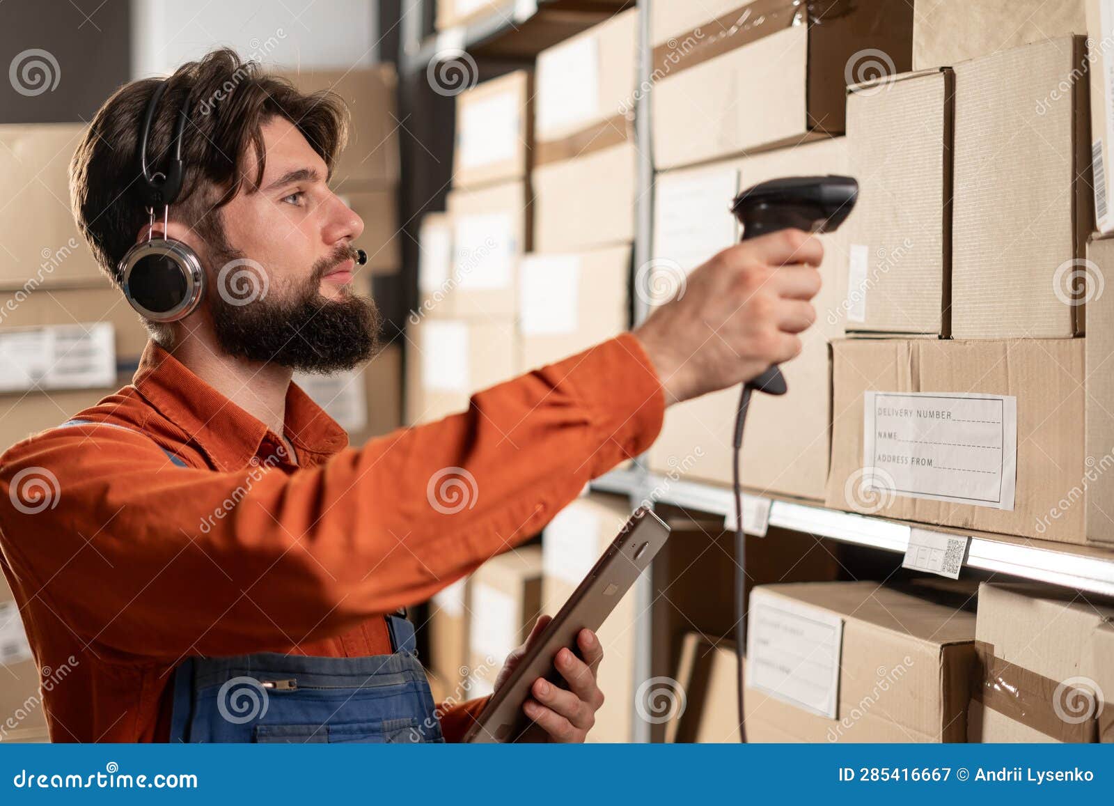 Warehouse Manager with Barcode Reader and Tablet PC. Inventory Control ...