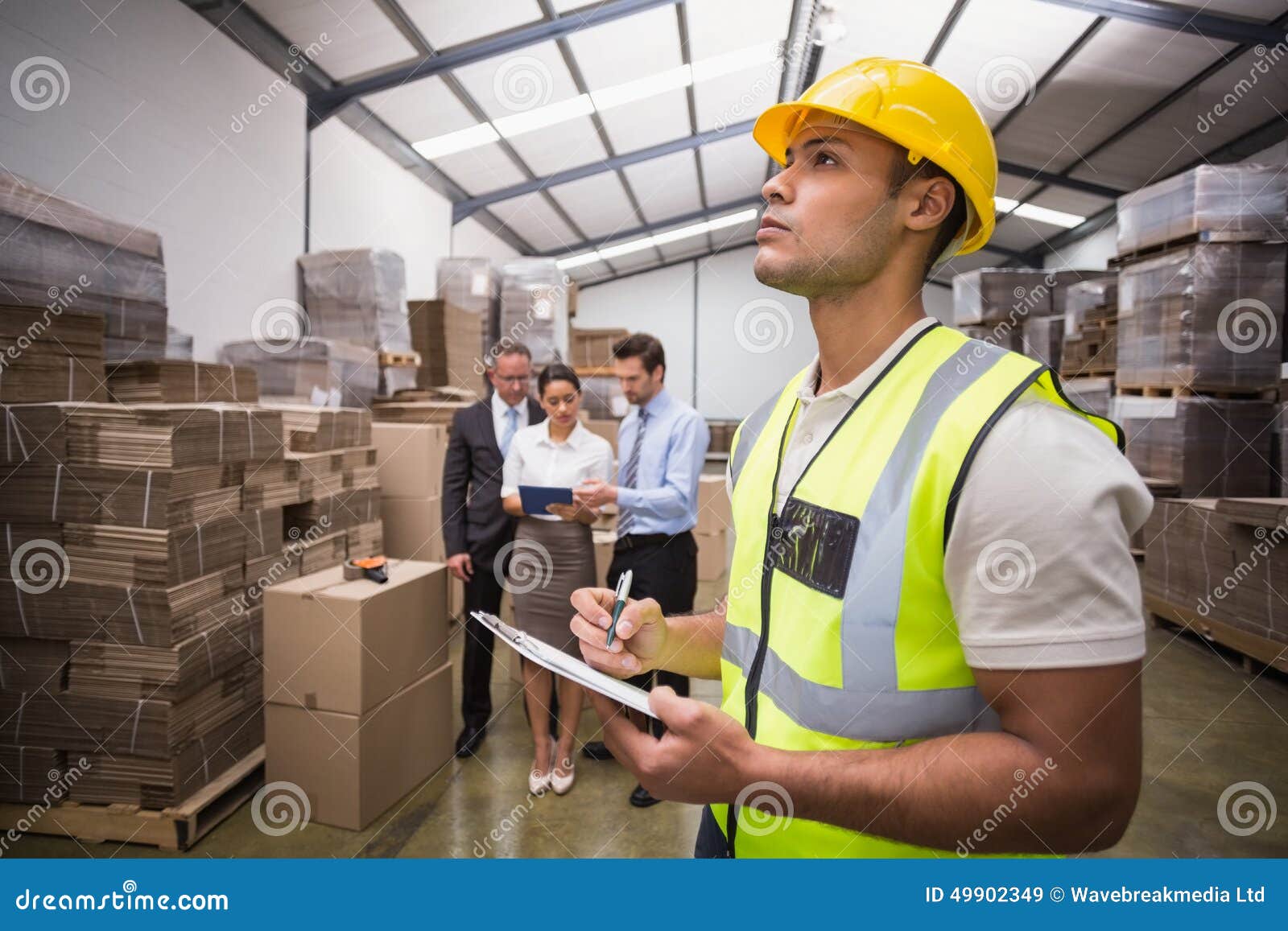 Warehouse Manager Checking His Inventory Stock Image - Image of female ...