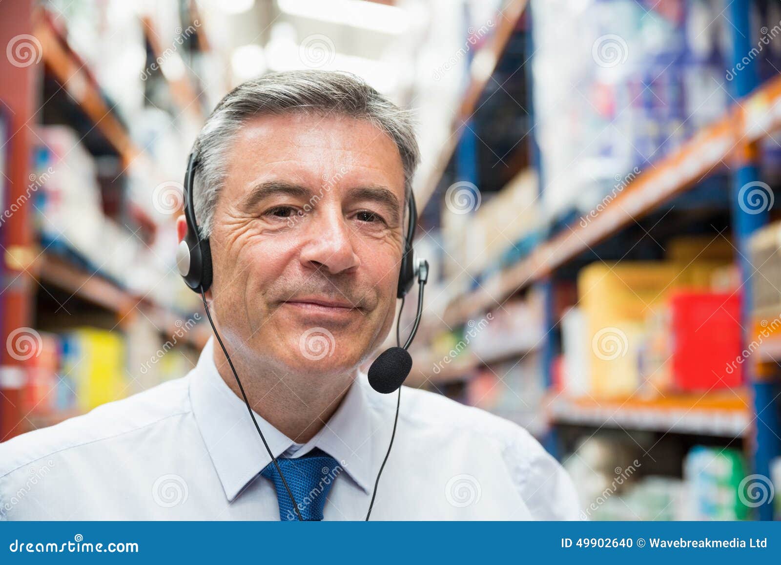 Warehouse Manager Giving Orders on Headset Stock Photo - Image of ...