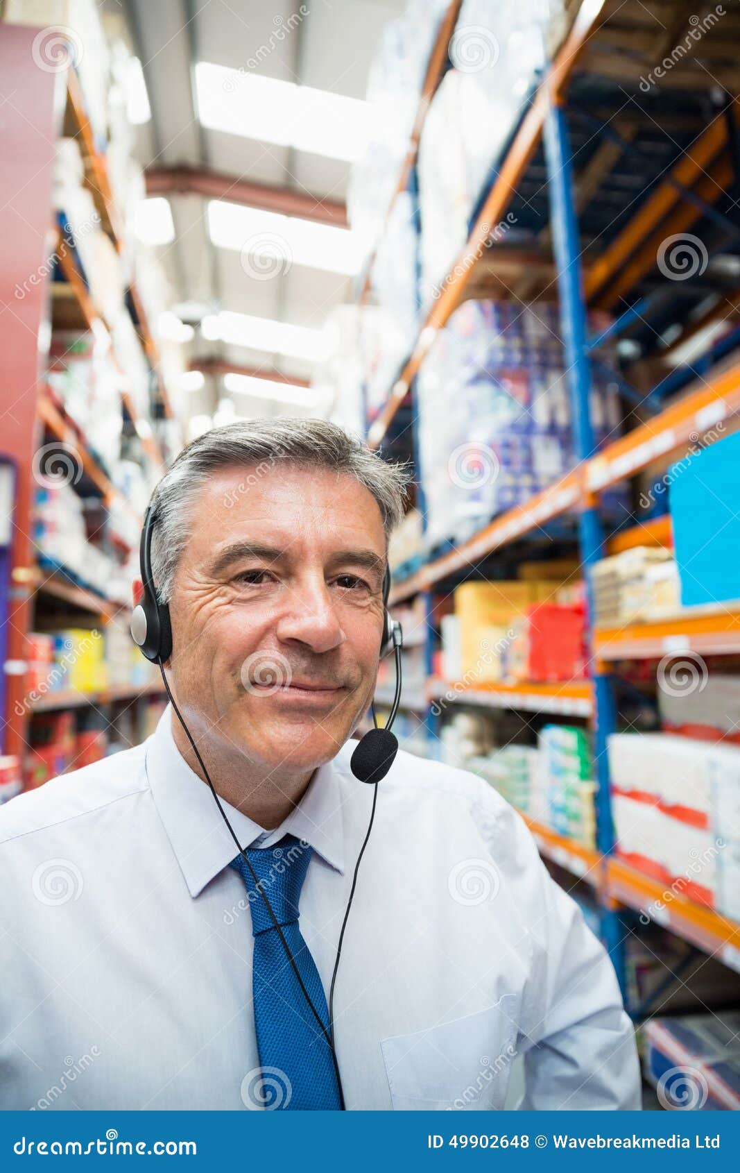 Warehouse Manager Giving Orders on Headset Stock Photo - Image of ...