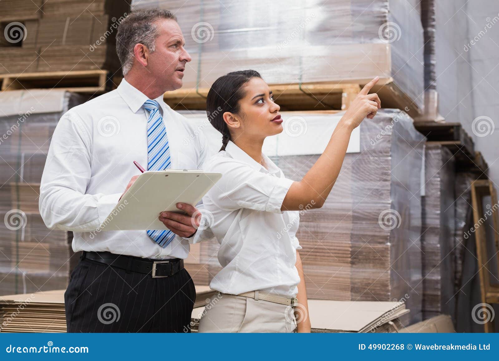 Warehouse Manager and Her Boss Checking Inventory Stock Photo - Image ...