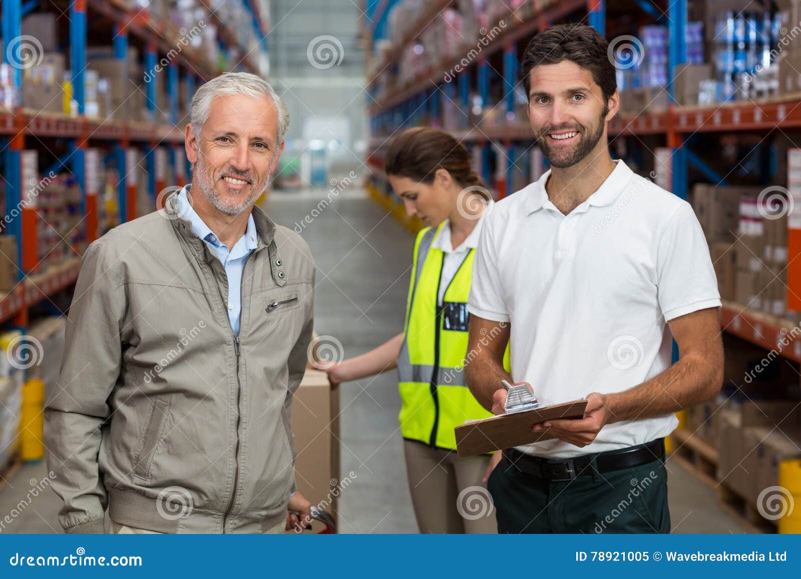 Warehouse Manager and Male Worker Smiling while Working Stock Image ...