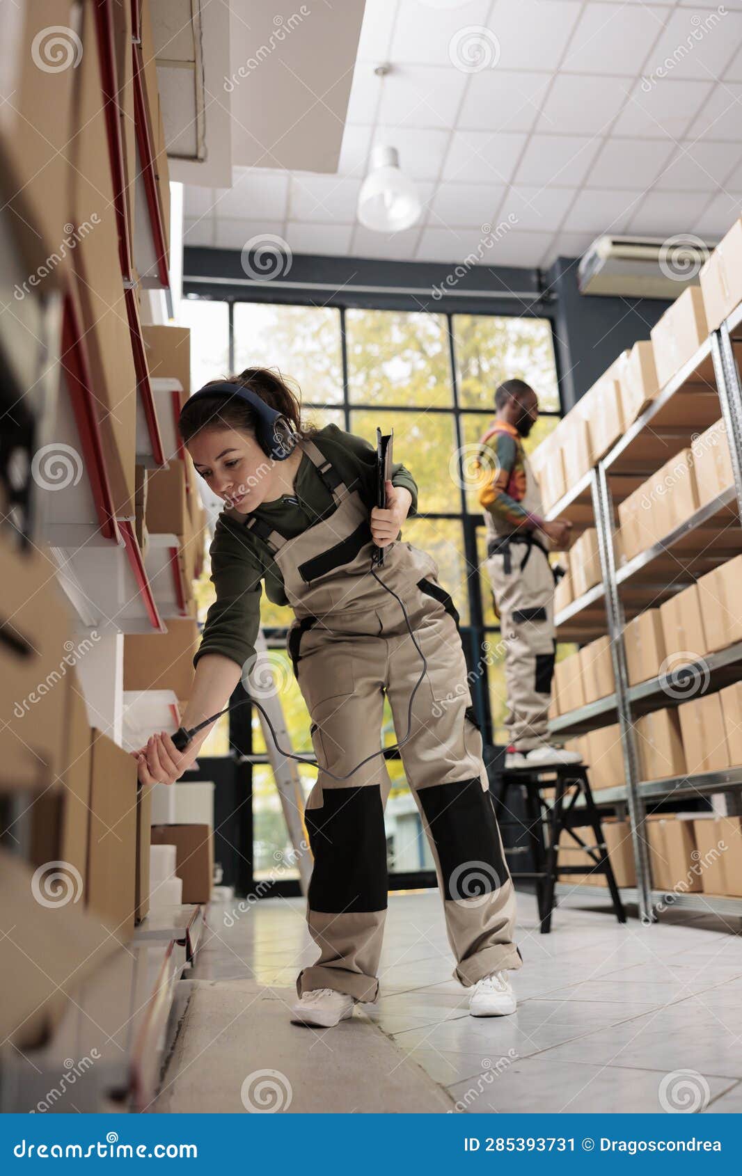 Warehouse Manager Scanning Cardboard Box Barcode Stock Image - Image of ...