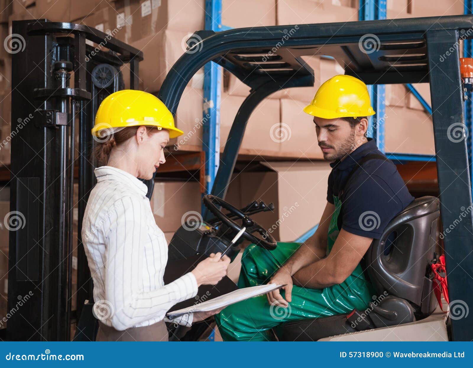 Warehouse Manager Talking with Forklift Driver Stock Photo - Image of ...