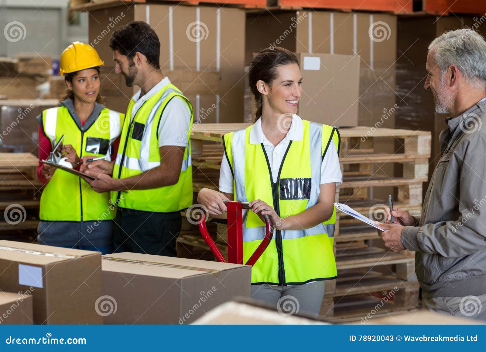 Warehouse Manager and Workers Preparing a Shipment Stock Image - Image ...