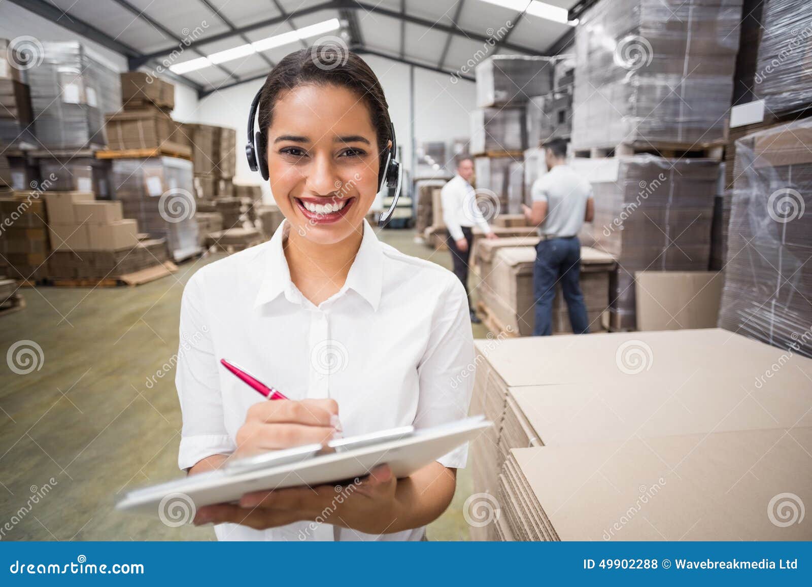 Warehouse Manager Writing on Clipboard Stock Photo - Image of standing ...