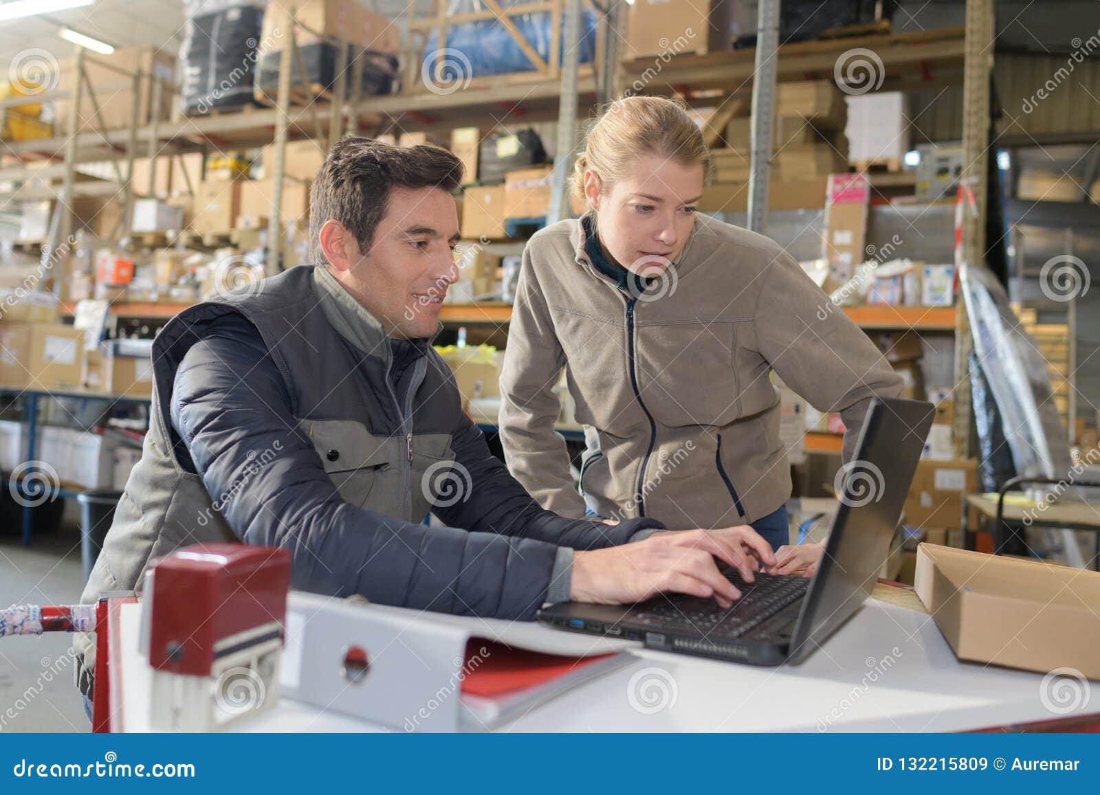 Warehouse Managers Using Laptop in Warehouse Stock Image - Image of ...