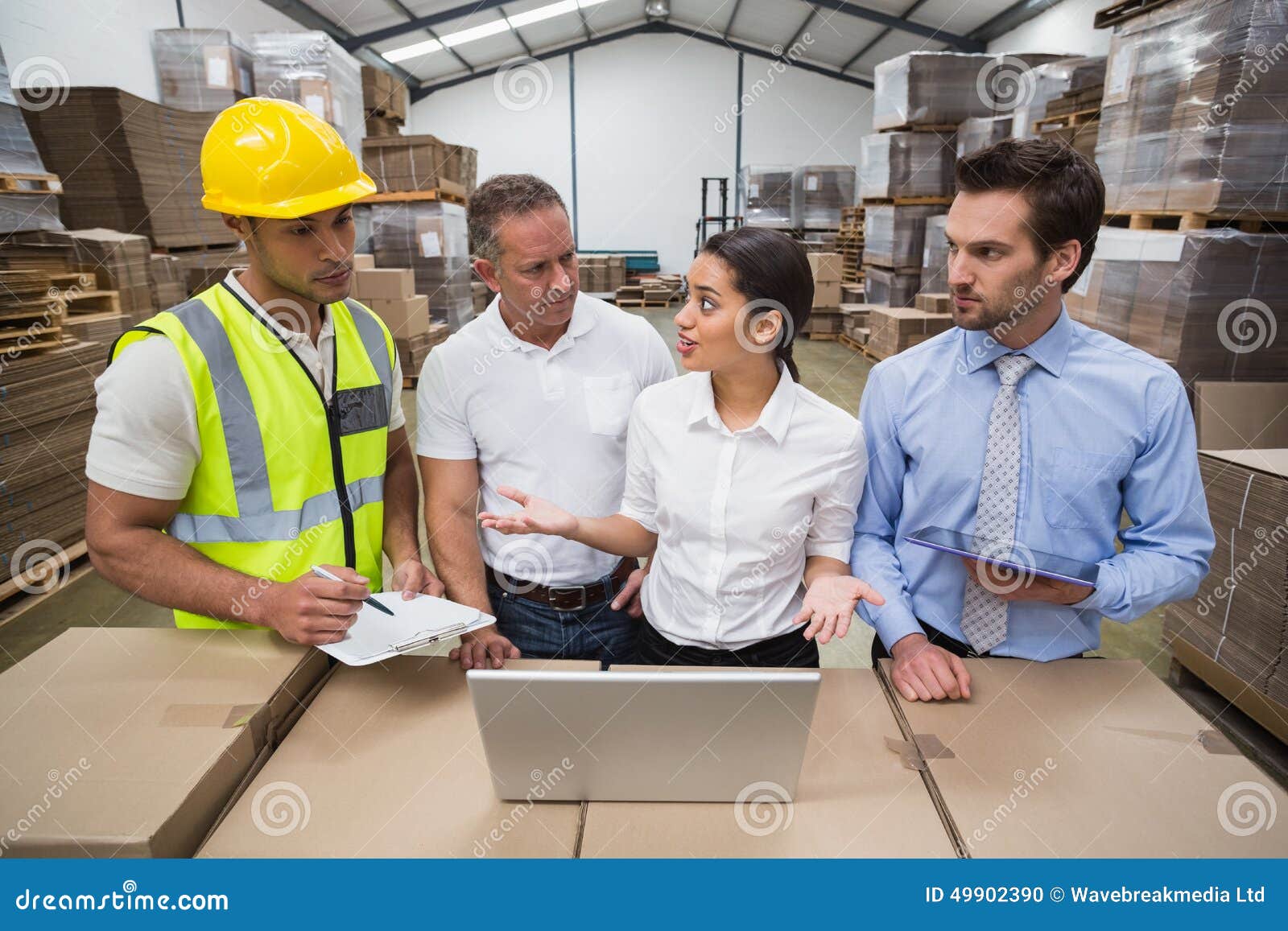 Warehouse Managers and Worker Talking Together Stock Photo - Image of ...