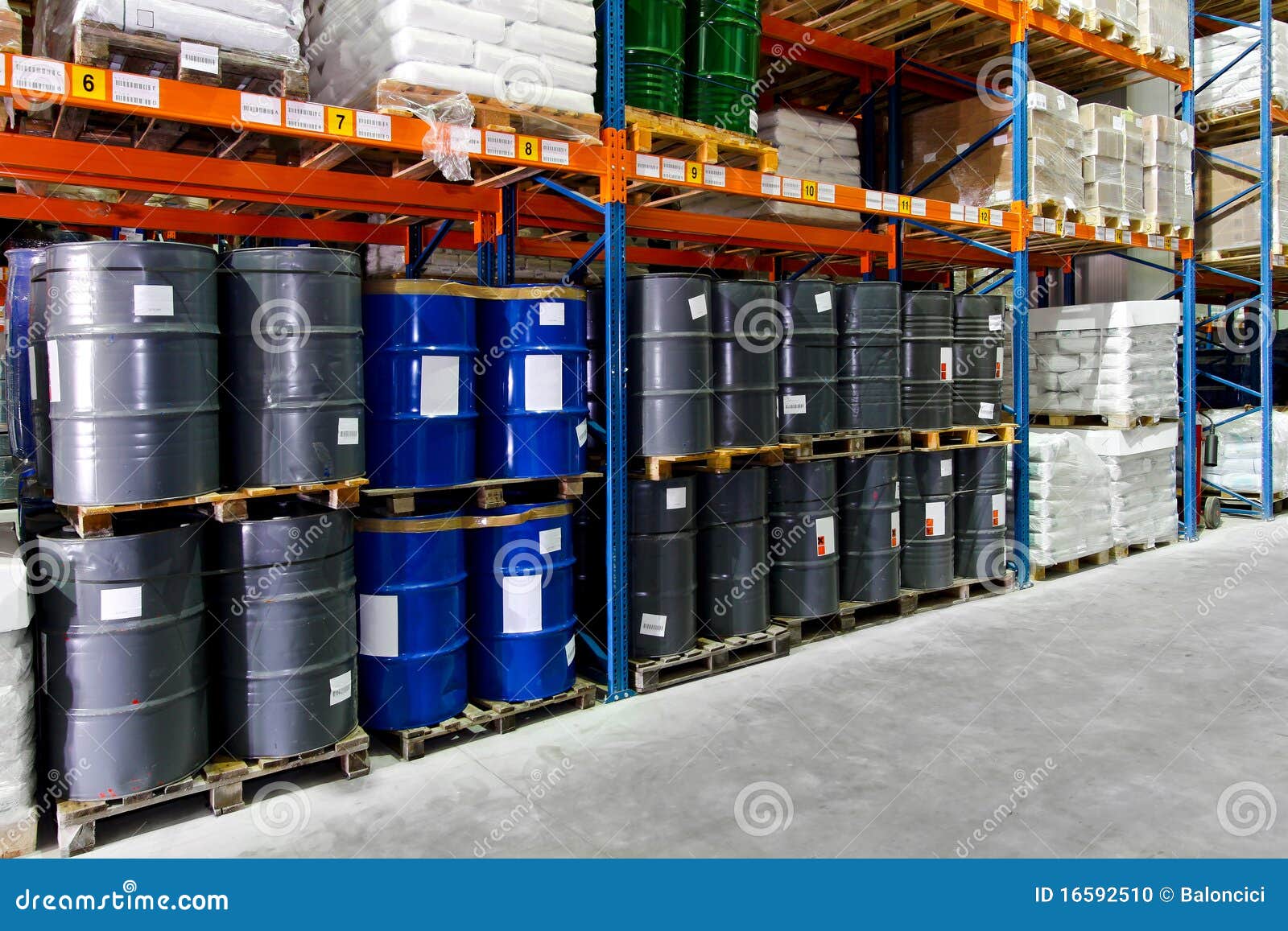 Warehouse metal barrels stock photo. Image of barrels - 16592510