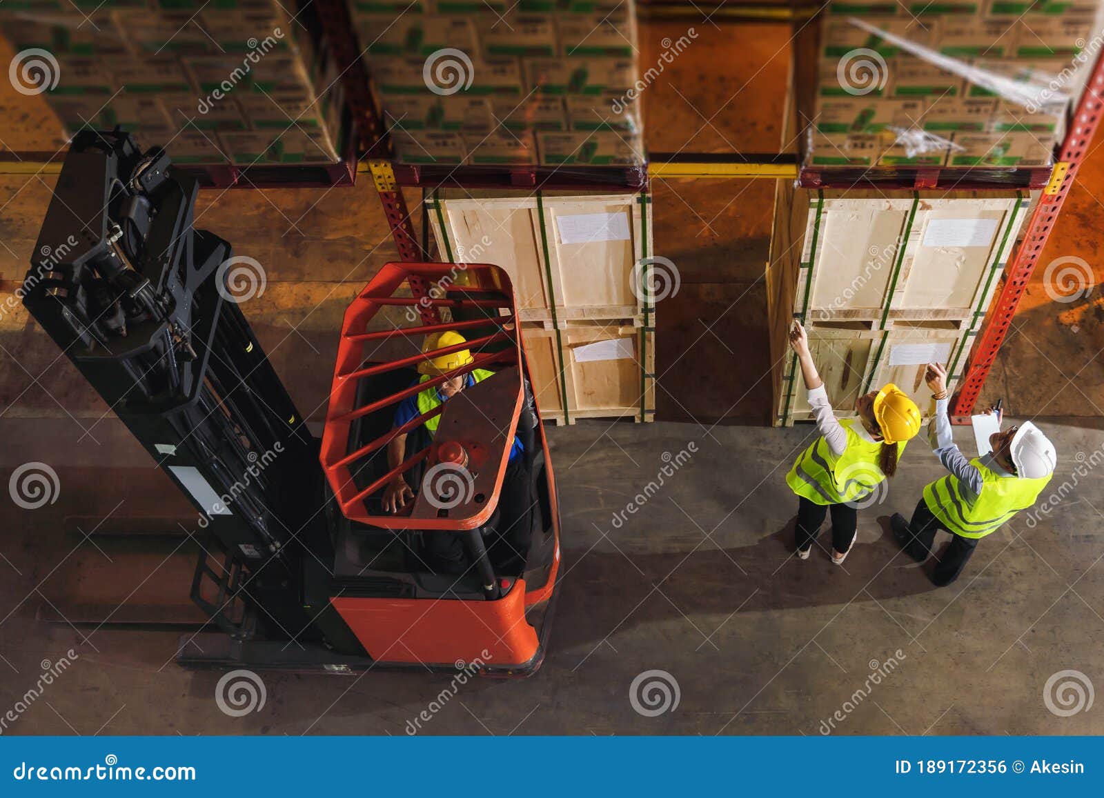 Warehouse Operation Team with Forklift Working in Storage Warehouse ...