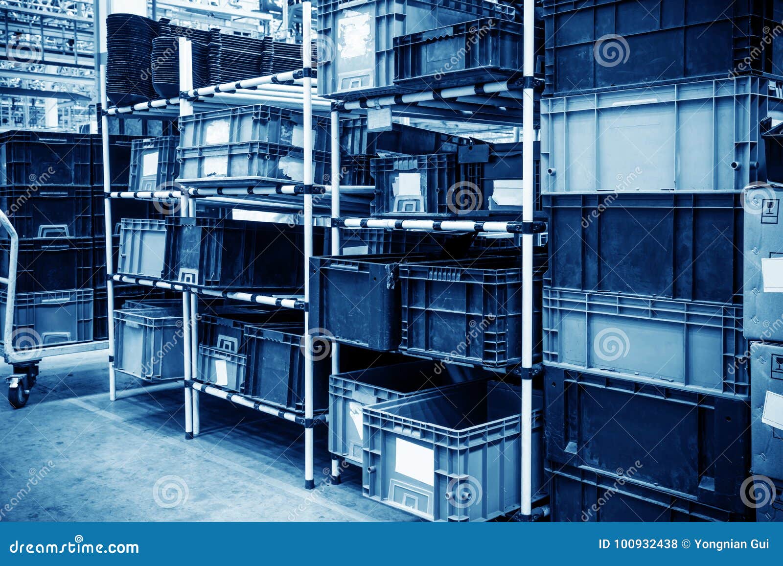 Warehouse of plastic box stock photo. Image of multi - 100932438
