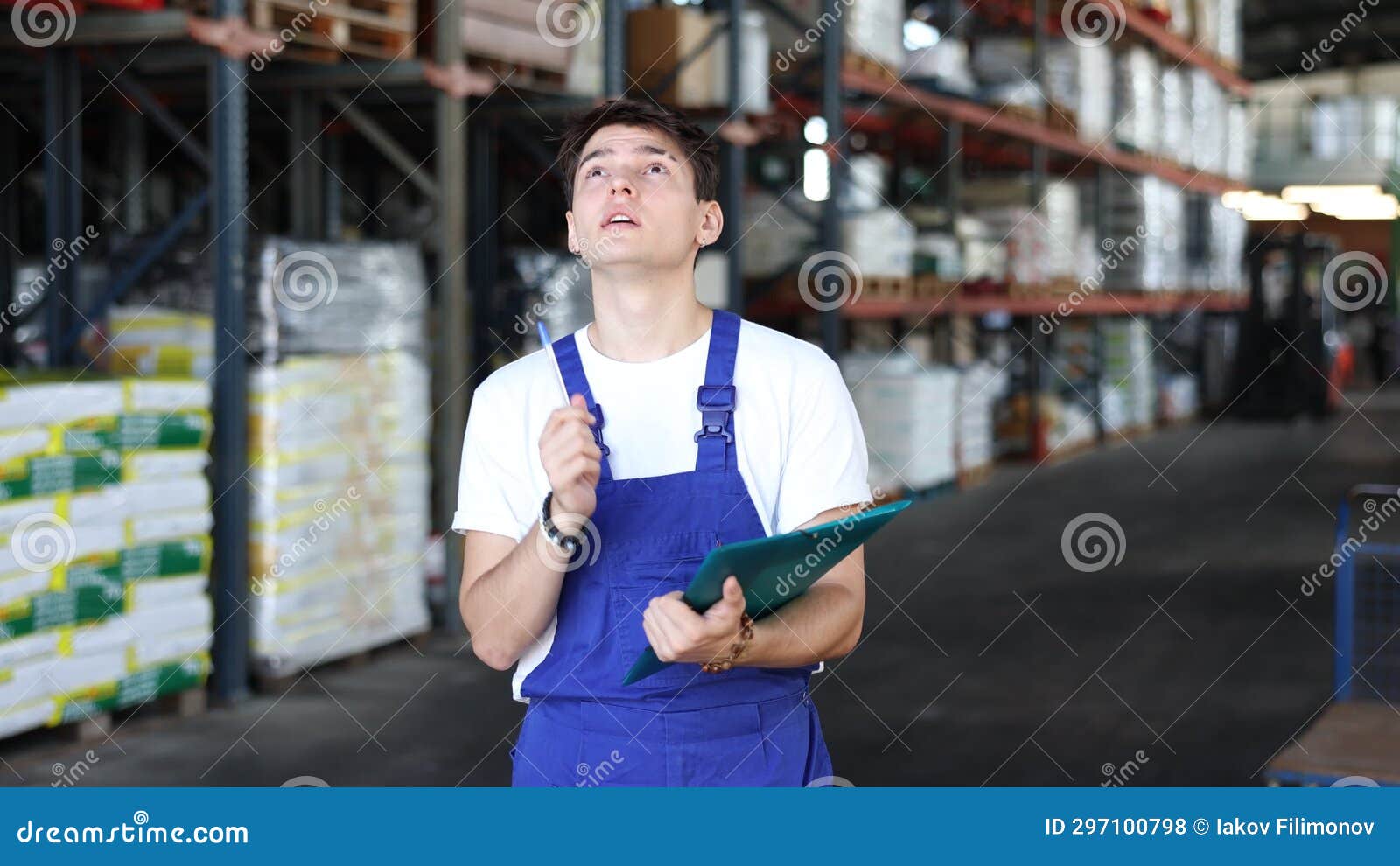 In Warehouse of Store, Guy Checks Quantity of Goods and Receipt ...