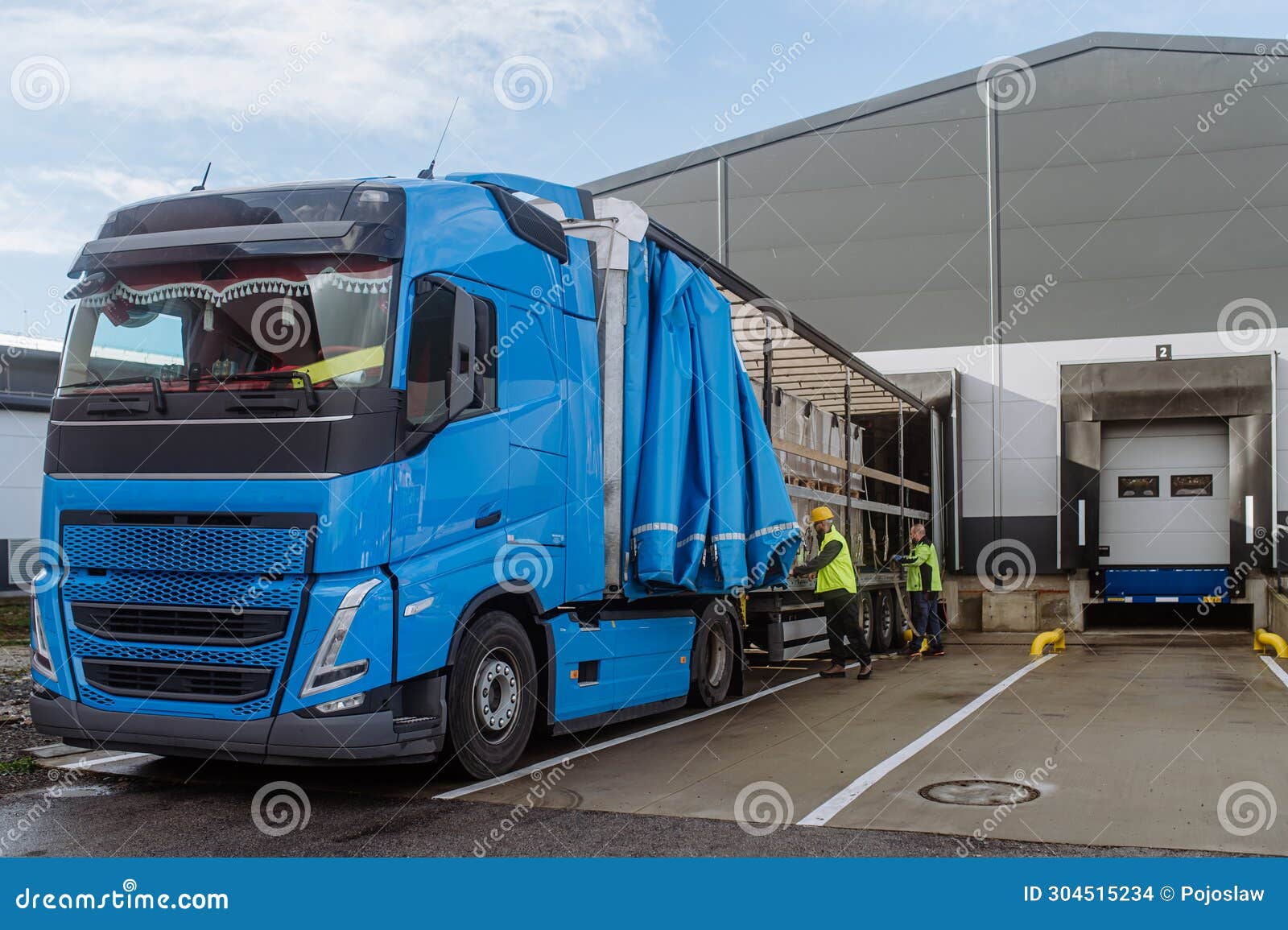 Warehouse Receivers Unloading of the Truck in Front of Warehouse ...