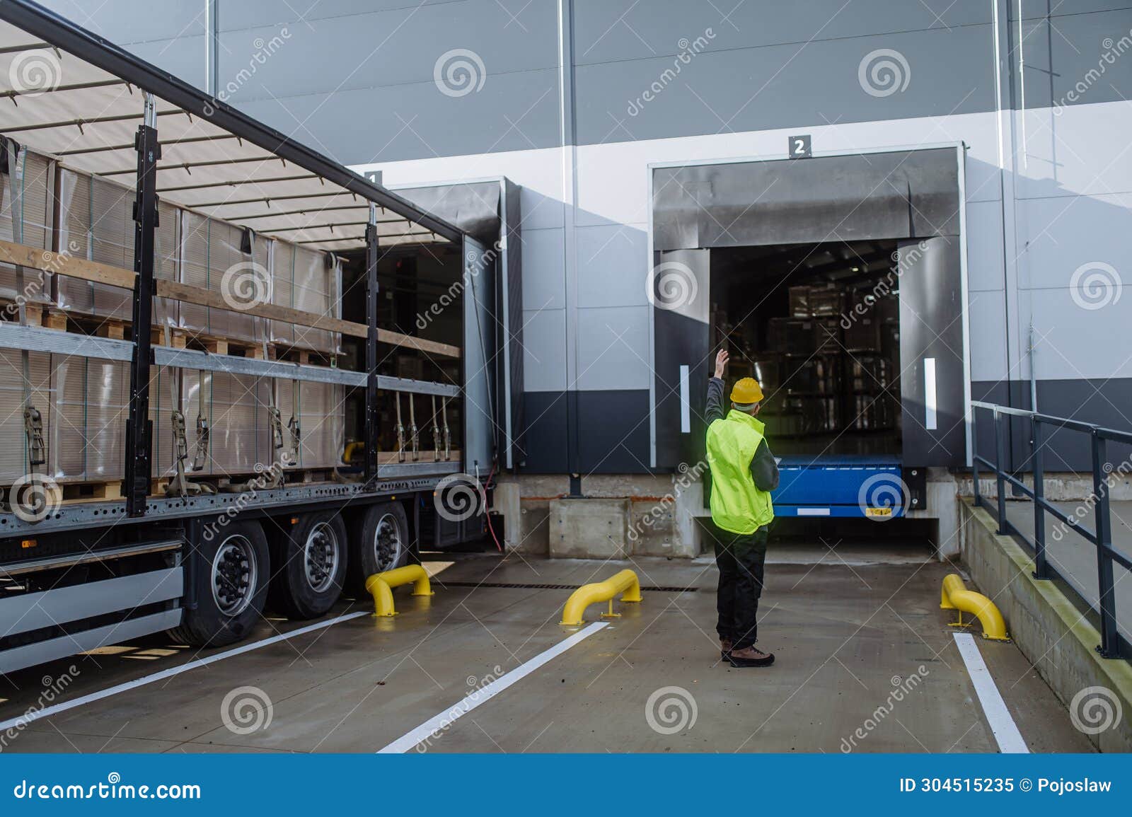 Warehouse Receivers Unloading of the Truck in Front of Warehouse ...