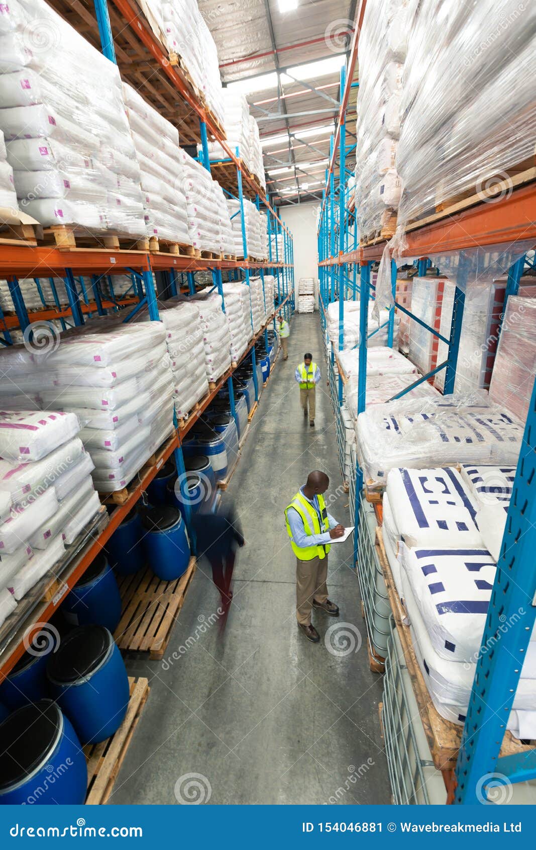 Warehouse Staff Checking Stocks in Warehouse Stock Image - Image of ...