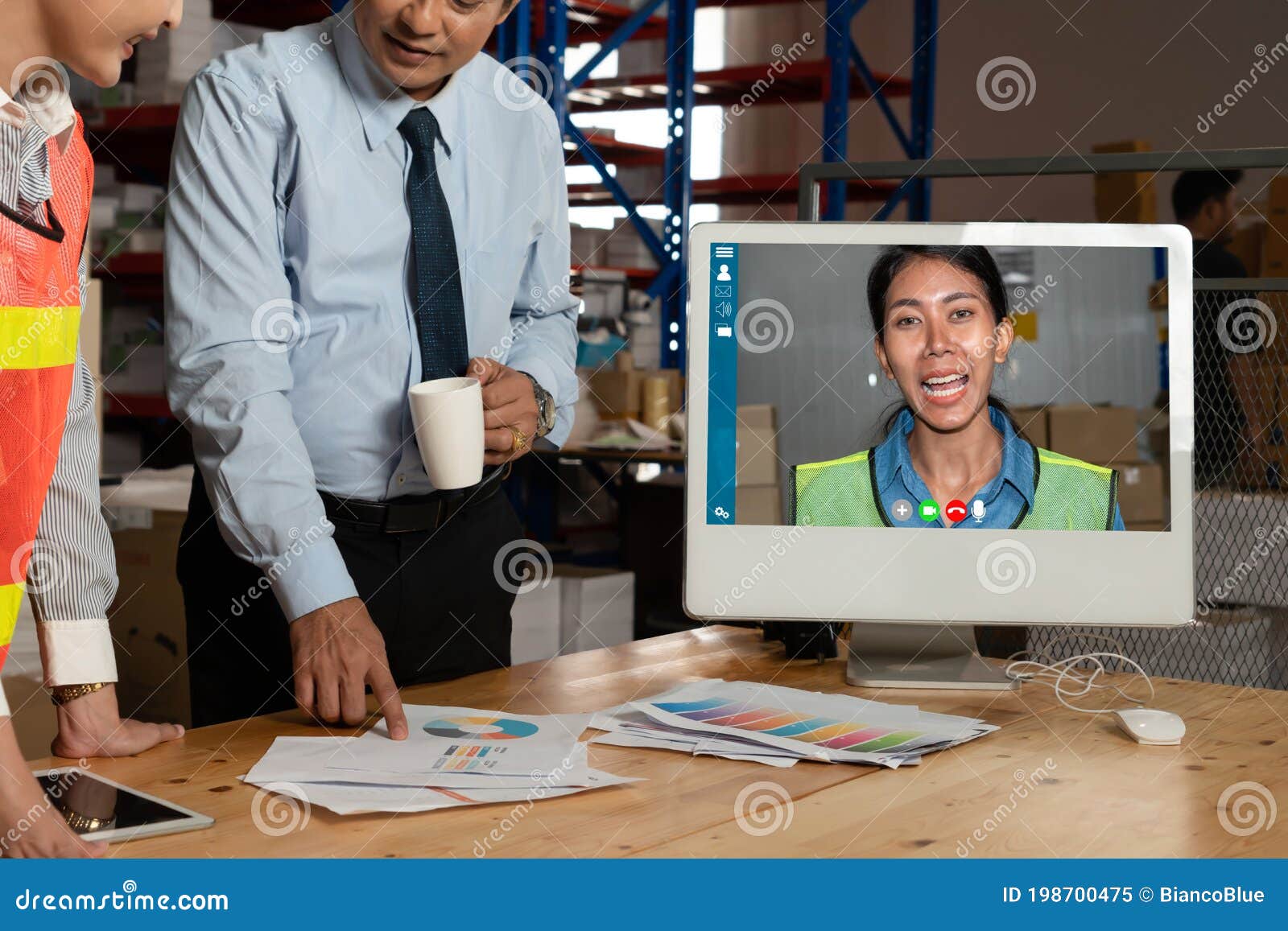Warehouse Staff Talking on Video Call at Computer Screen in Storage ...