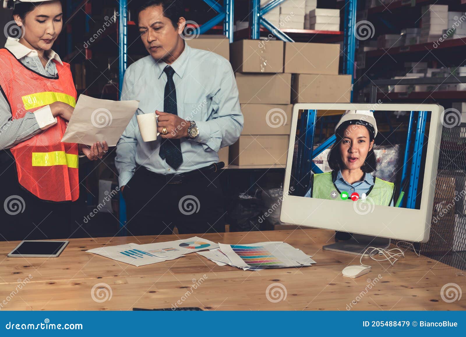 Warehouse Staff Talking on Video Call at Computer Screen in Storage ...