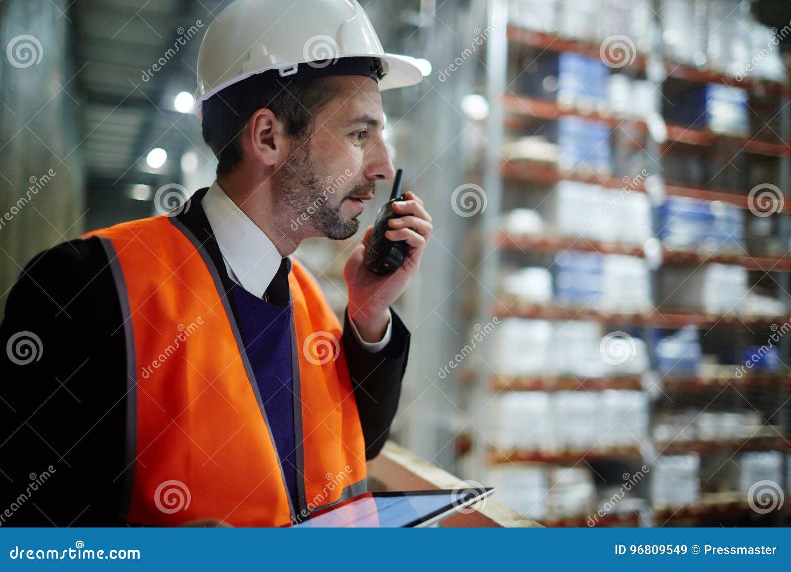 Warehouse Supervisor Managing Work Operations Stock Image - Image of ...