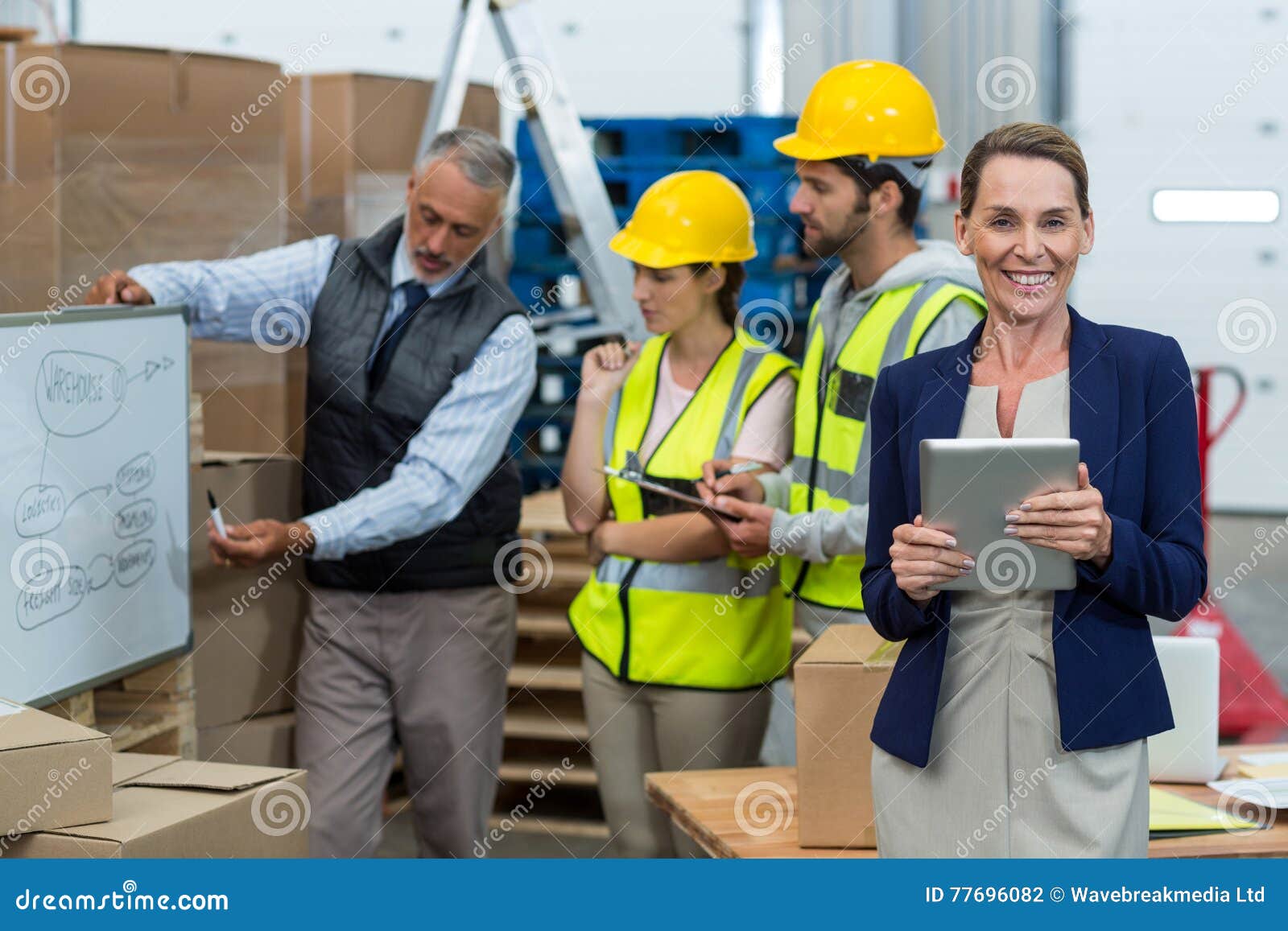 Warehouse Team Having a Meeting Stock Photo - Image of female, beard ...
