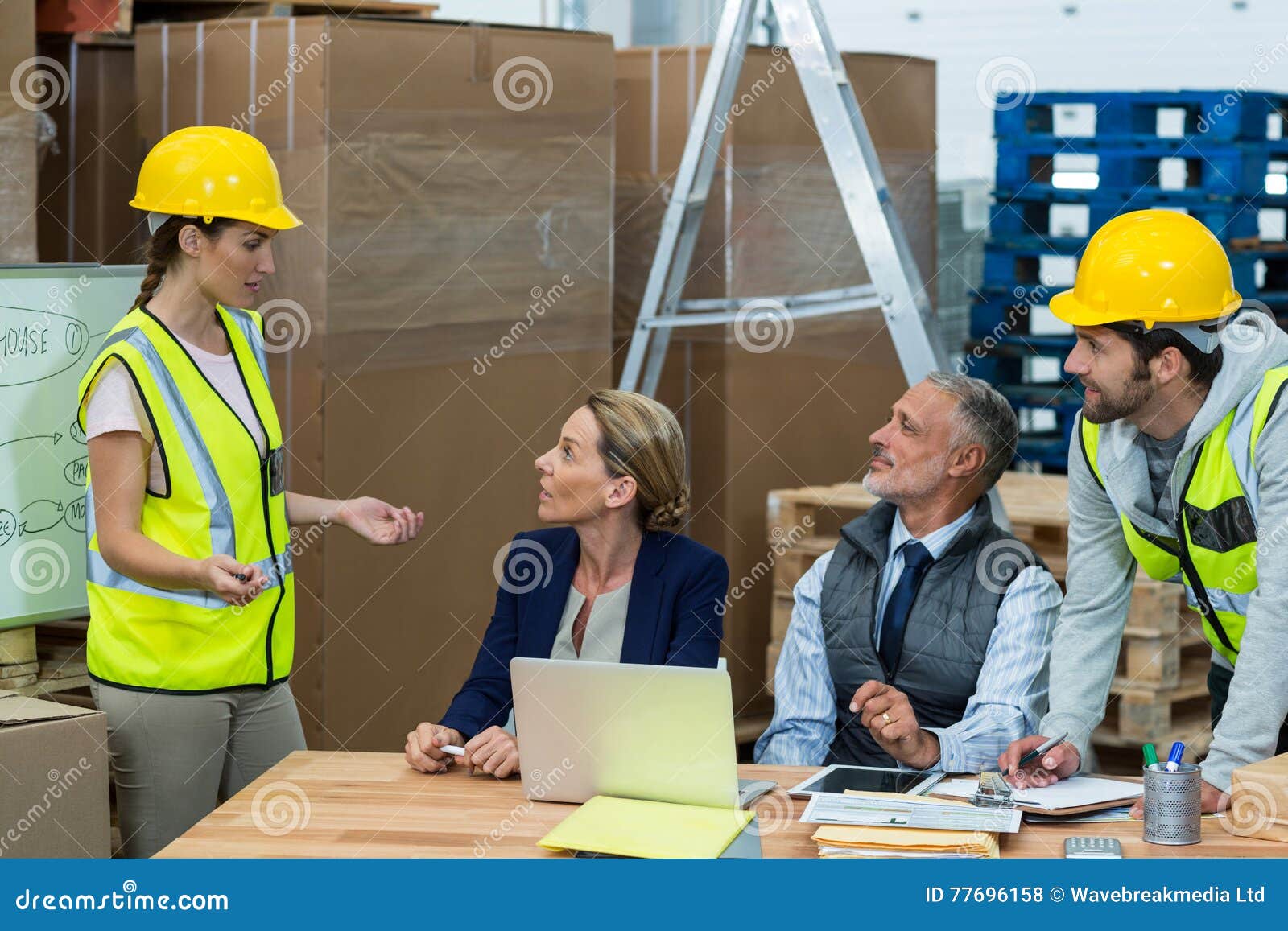 Warehouse Team Having a Meeting Stock Photo - Image of happiness ...