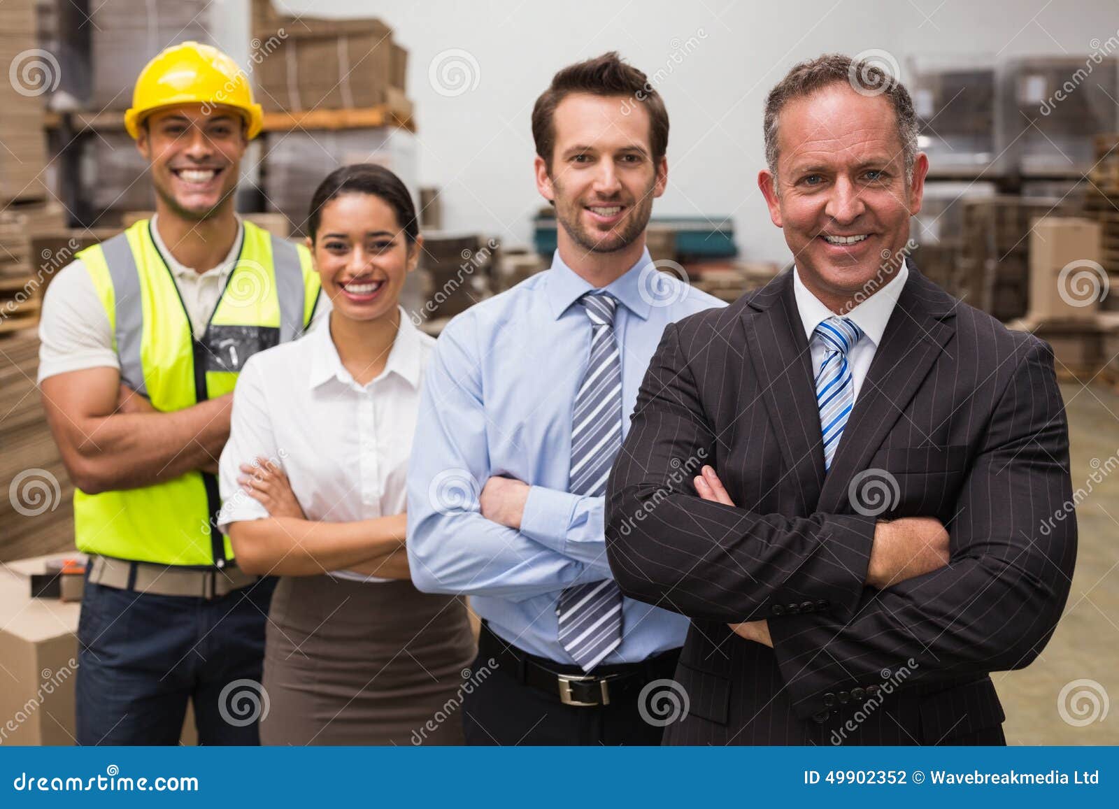 Warehouse Team Smiling at Camera Stock Photo - Image of confident ... Warehouse Team Smiling at Camera Stock Photo - Image of confident ...