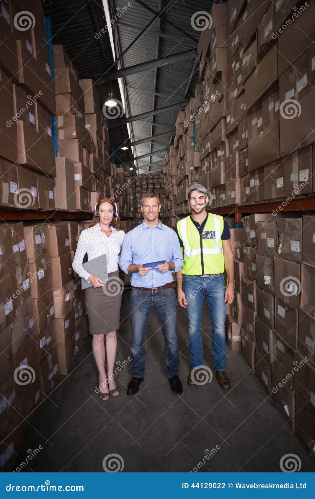 Warehouse Team Smiling at Camera Stock Photo - Image of indoors, young ...