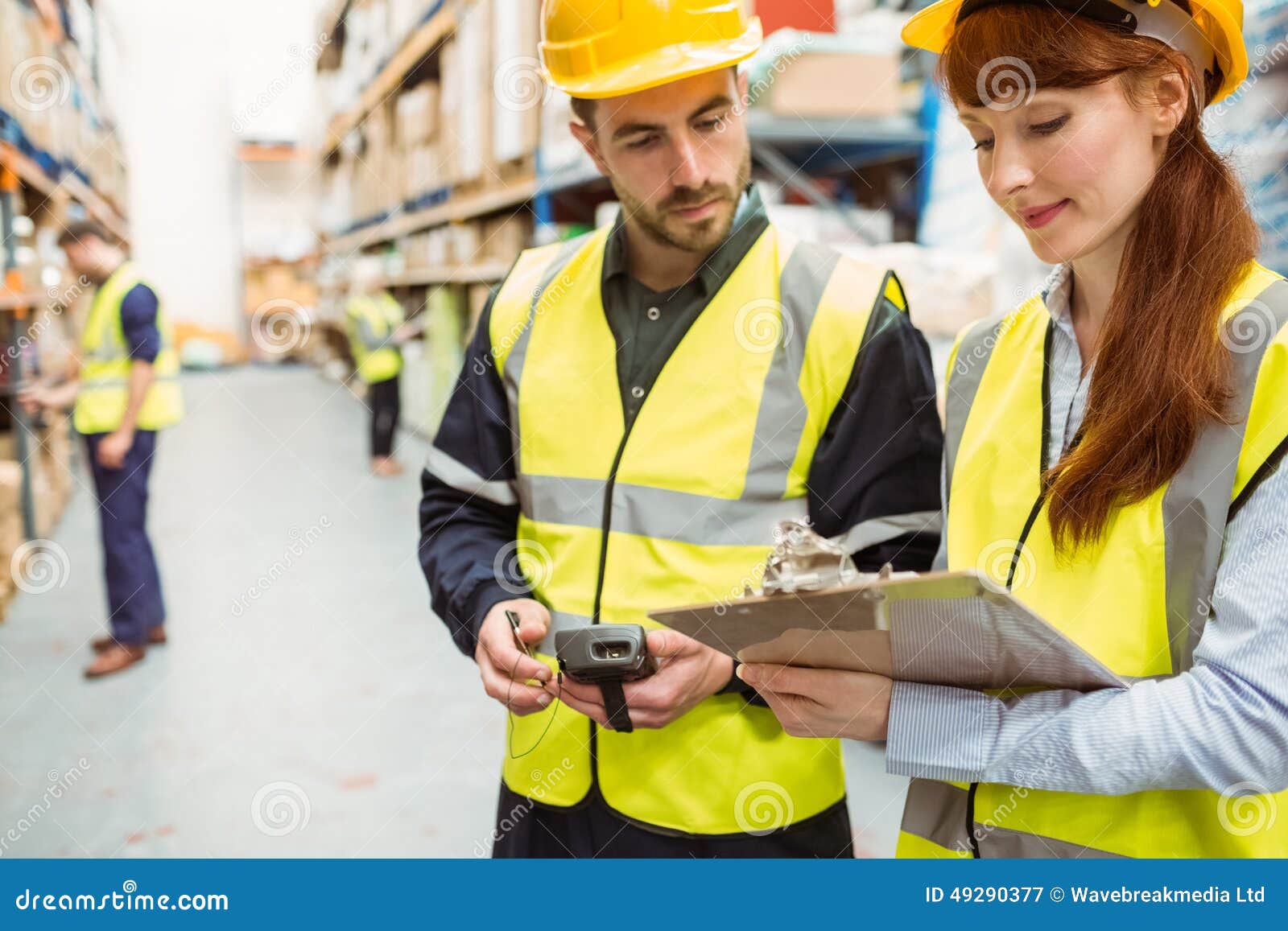 Warehouse Team Working Together with Clipboard Stock Image - Image of ...