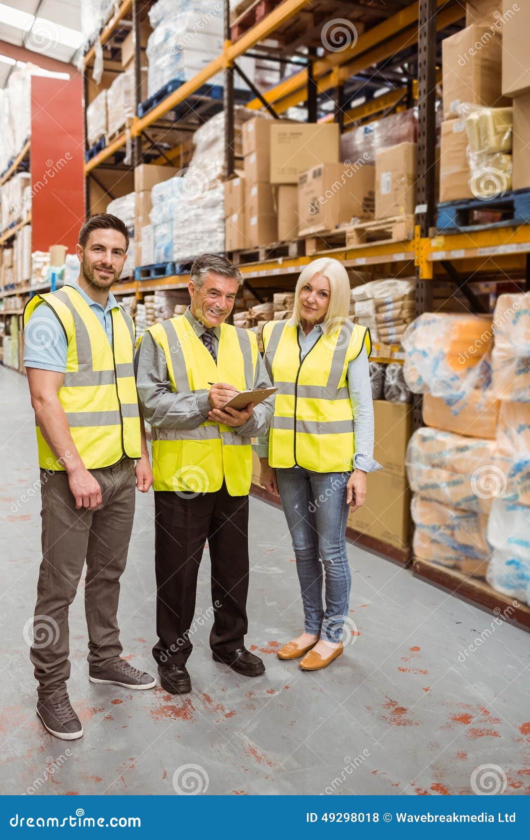 Warehouse Team Working Together Wile Smiling at Camera Stock Photo - Image of caucasian, happy ...