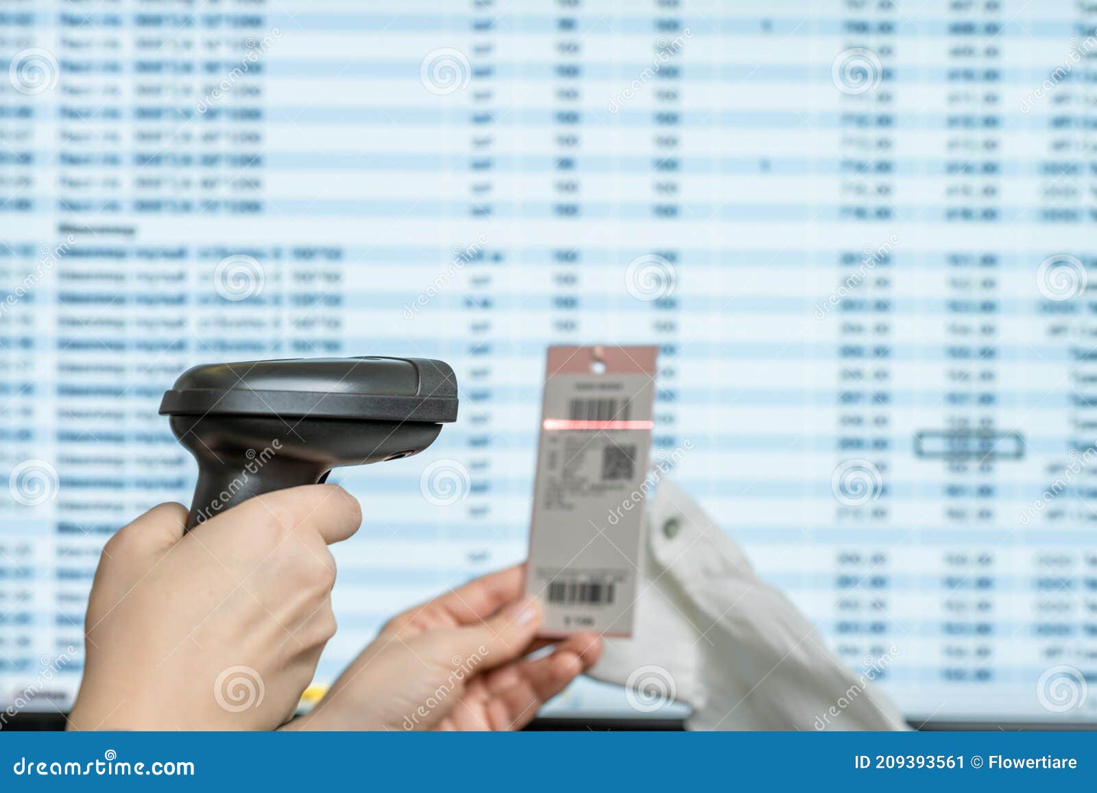 A Warehouse Woman Employee Accepts Cargo, Goods Using Barcode Scanner ...