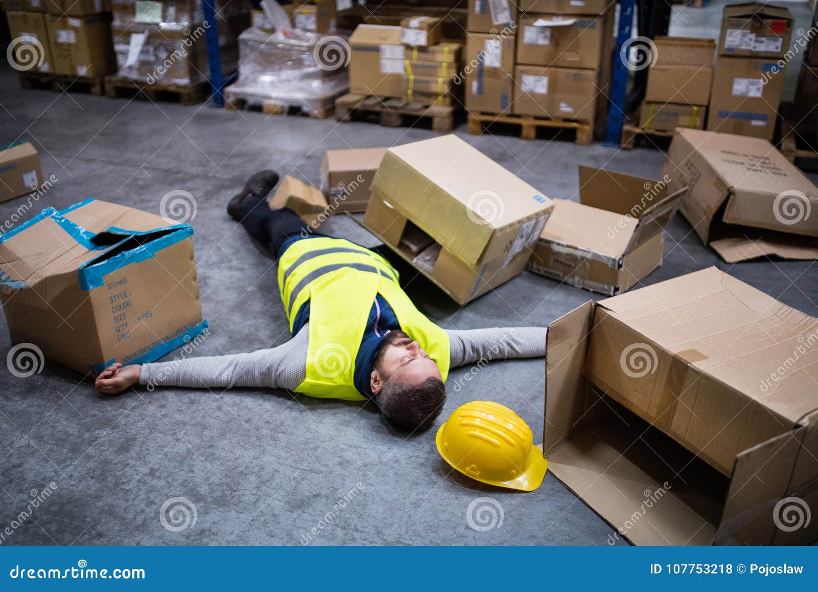 Warehouse Worker after an Accident in a Warehouse. Stock Photo - Image ...